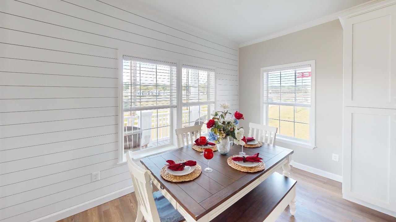 THE-ORLEANS-by-Impact-Housing-Dining-Room - Gainey Custom Homes